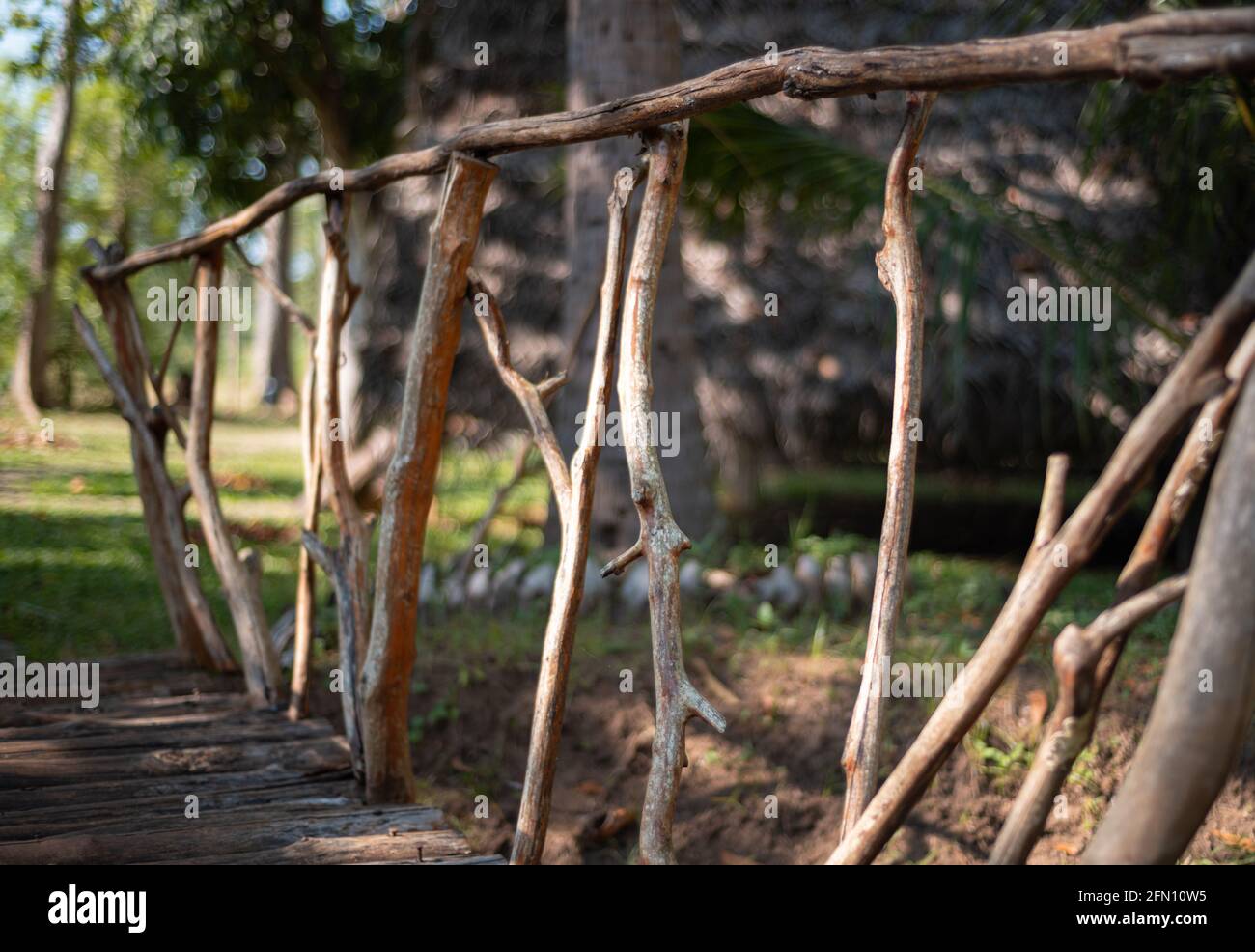 Small bridge made from tree branches in a garden for mainly for décor ...