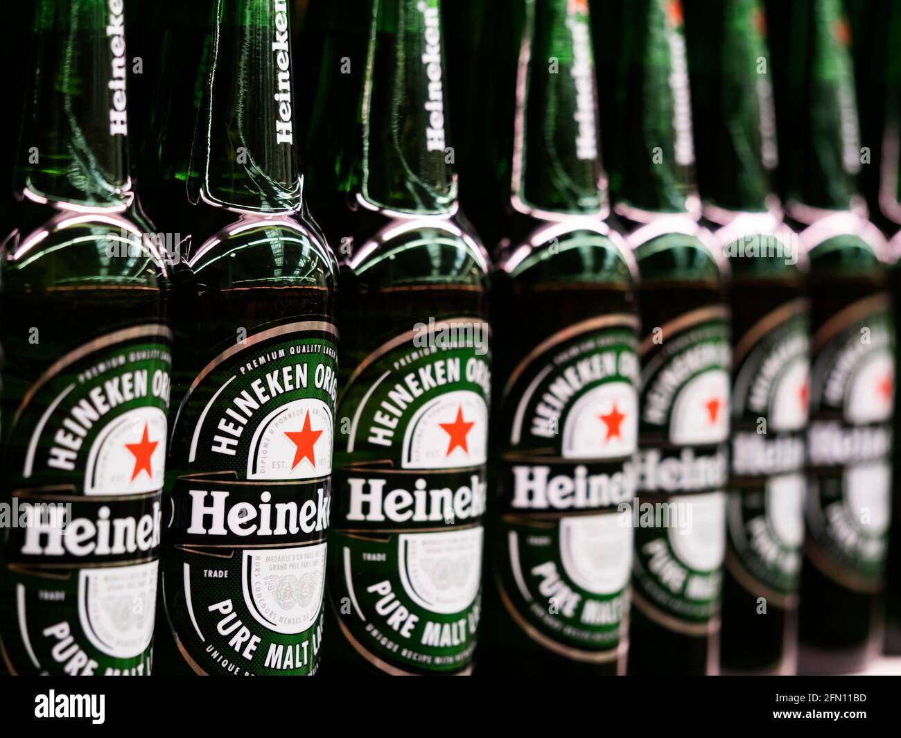 Bottles of Heineken beer on a shelf in a store Stock Photo - Alamy