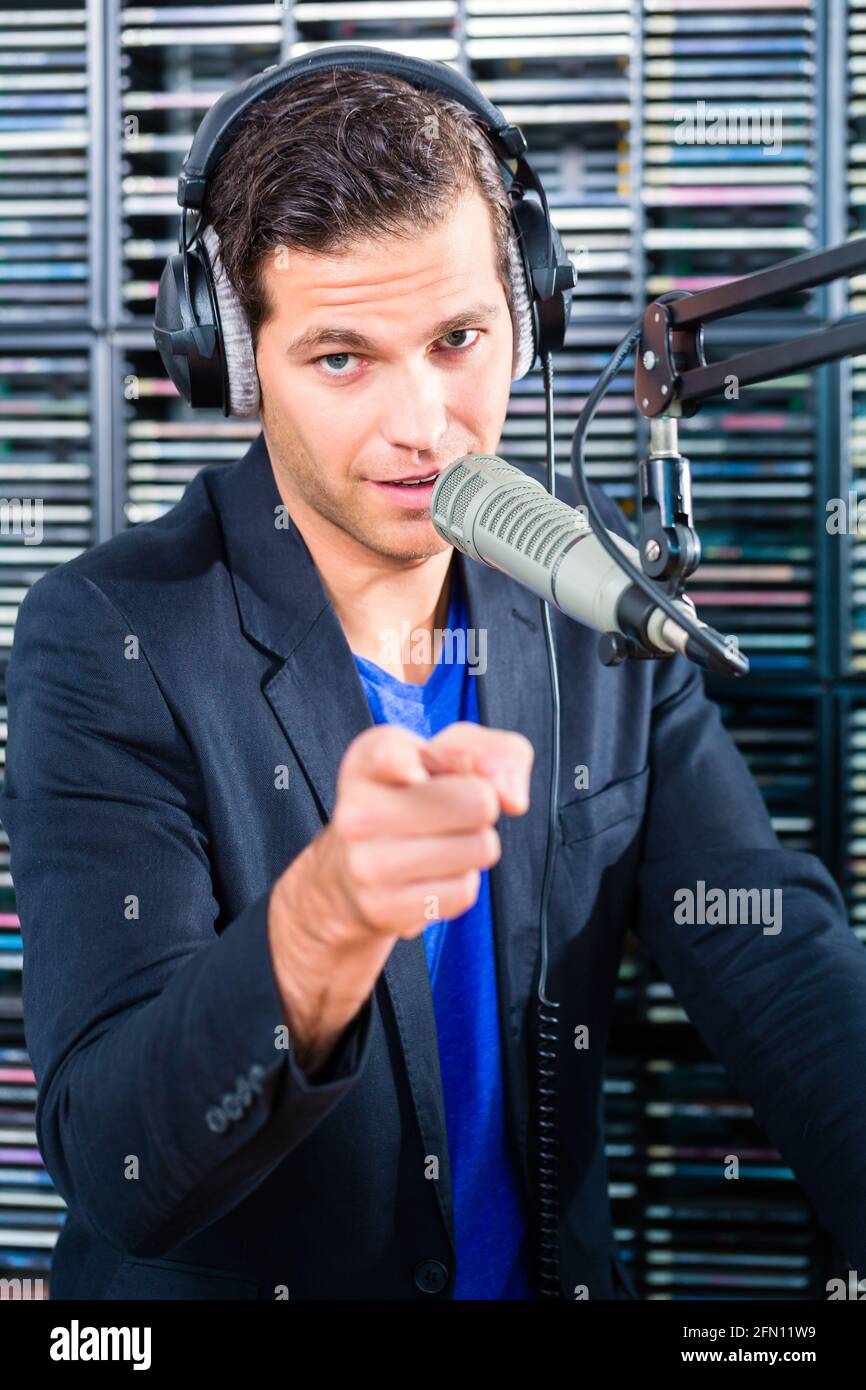 Male Presenter in radio station hosting show for radio live in Studio ...