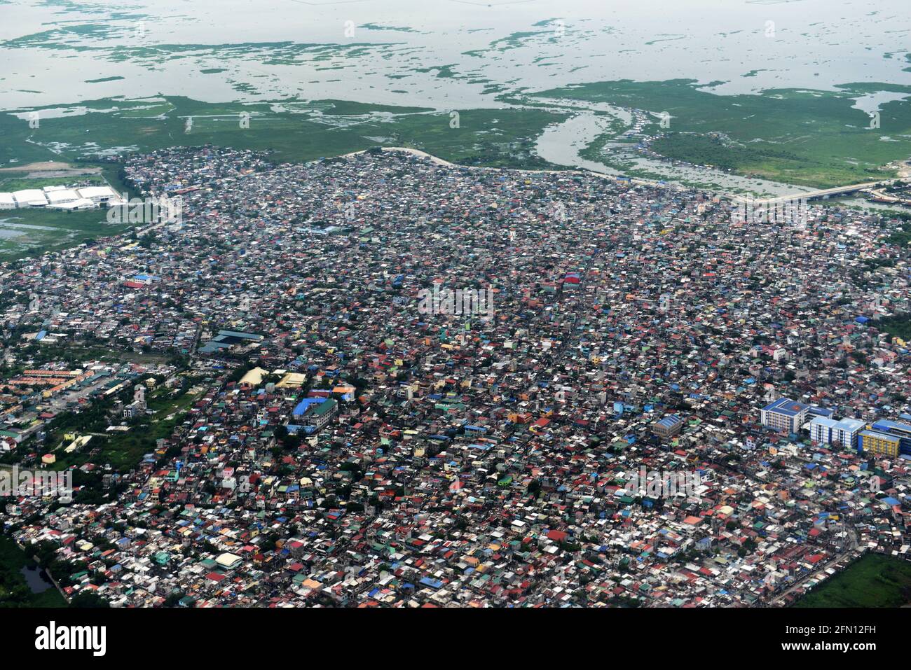 Aerial view of crowded residential neighborhoods in Manila, The ...