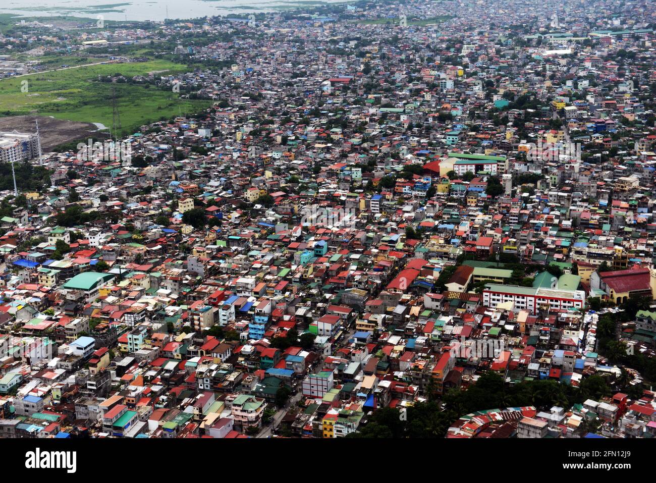 Aerial view of crowded residential neighborhoods in Manila, The ...