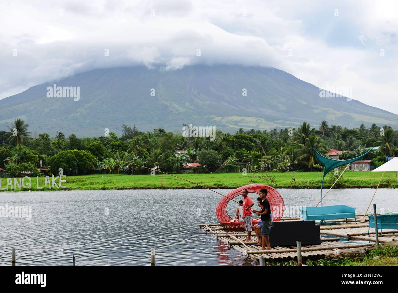 The Mayon volcano covered with a beautiful cloud Stock Photo - Alamy