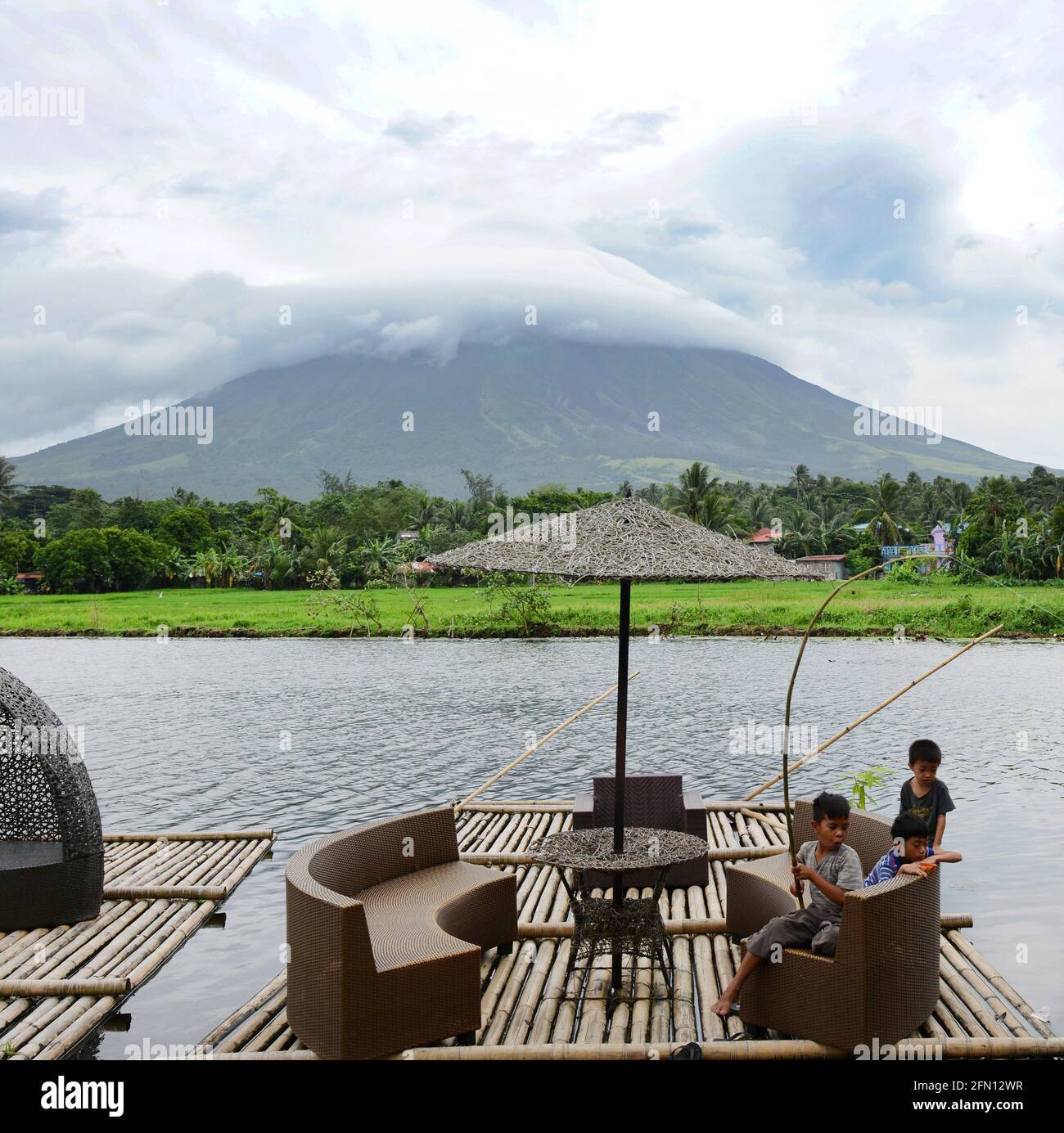 The Mayon volcano covered with a beautiful cloud Stock Photo - Alamy