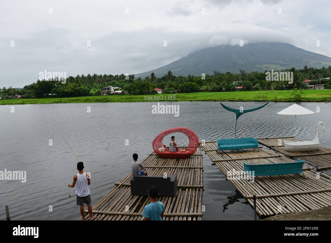 The Mayon volcano covered with a beautiful cloud Stock Photo - Alamy