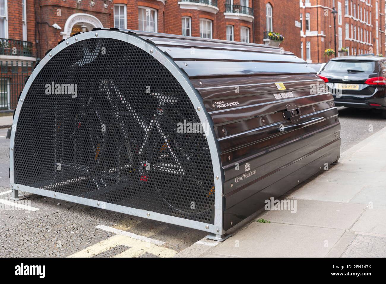Secure kerbside bicycle lock-up unit in Chiltern Street, Marylebone ...