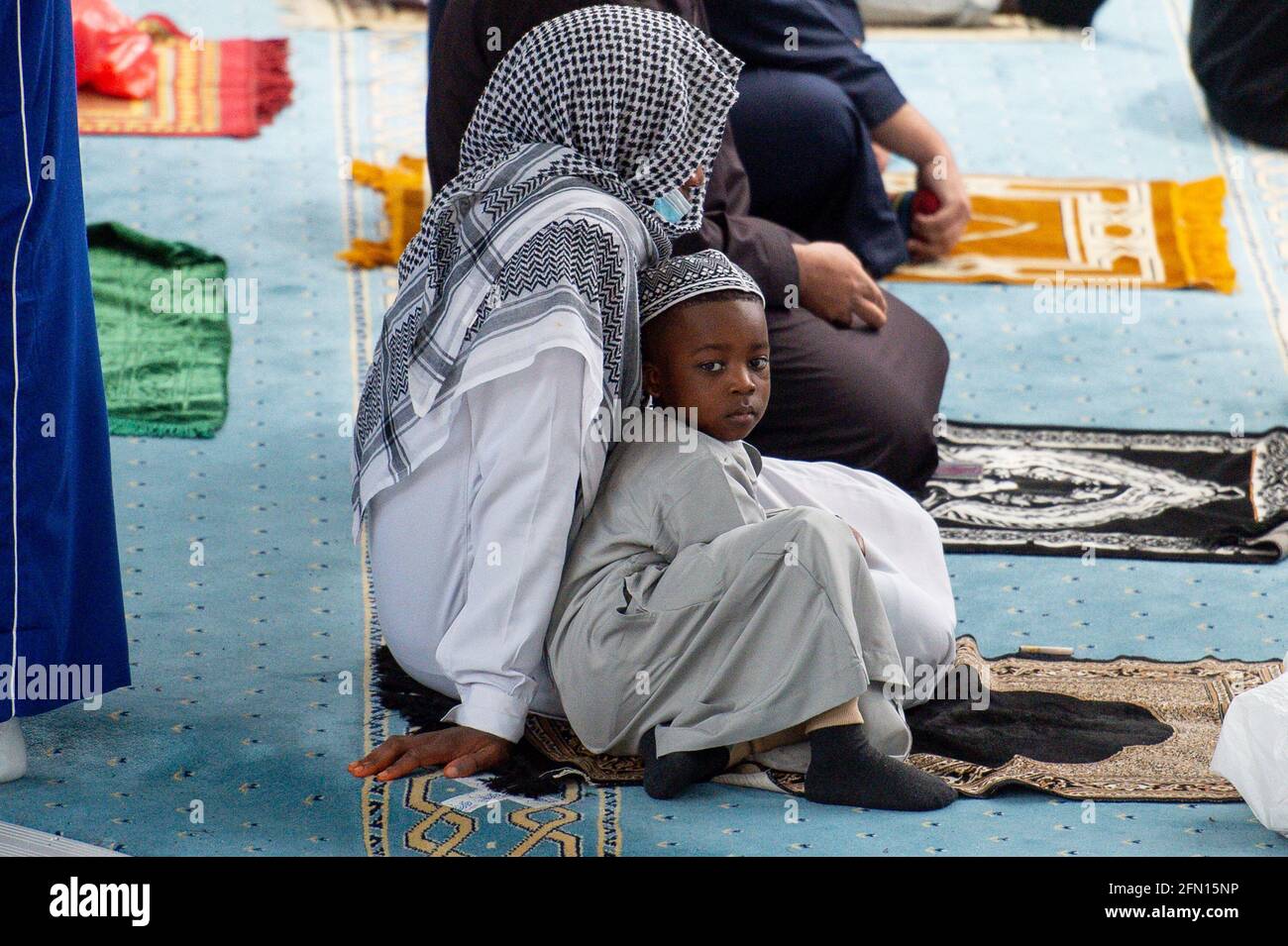 Worshippers at Green Lane Mosque in Birmingham take part in a prayer ...