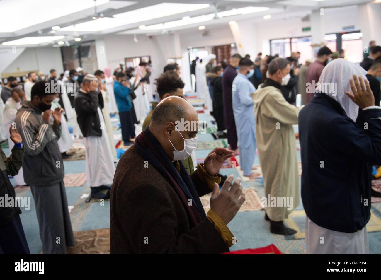 Worshippers at Green Lane Mosque in Birmingham take part in a prayer ...