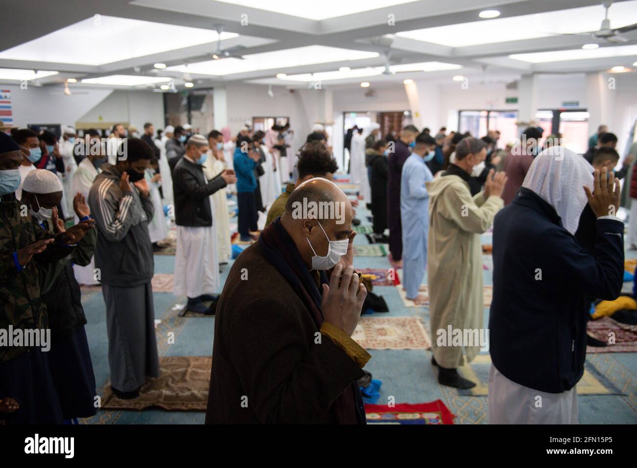 Worshippers at Green Lane Mosque in Birmingham take part in a prayer ...