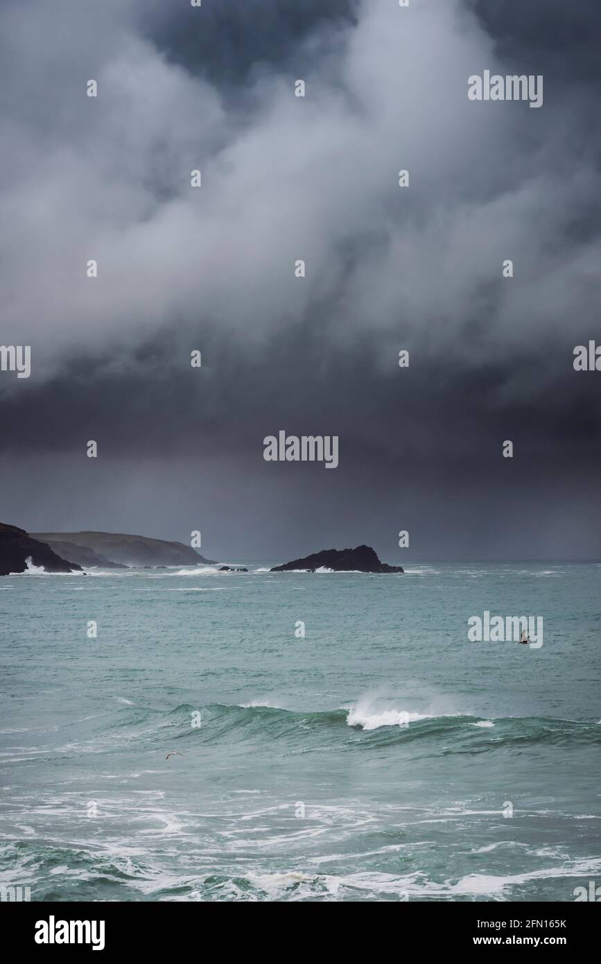 Dramatic storm clouds Fistral Bay in Newquay in Cornwall Stock Photo ...