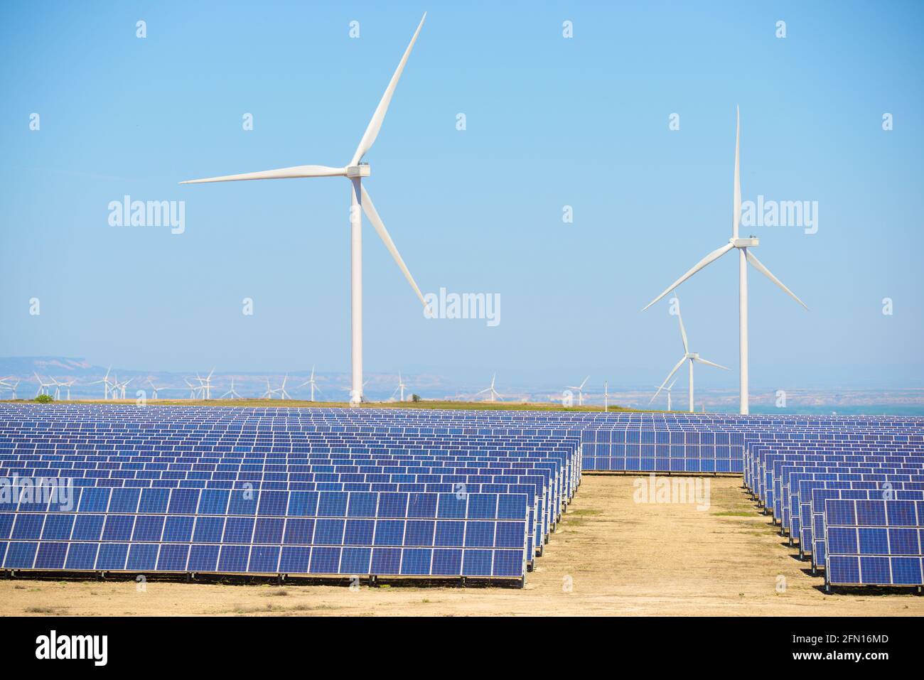 Many solar panels for electric production and windmills in Zaragoza ...