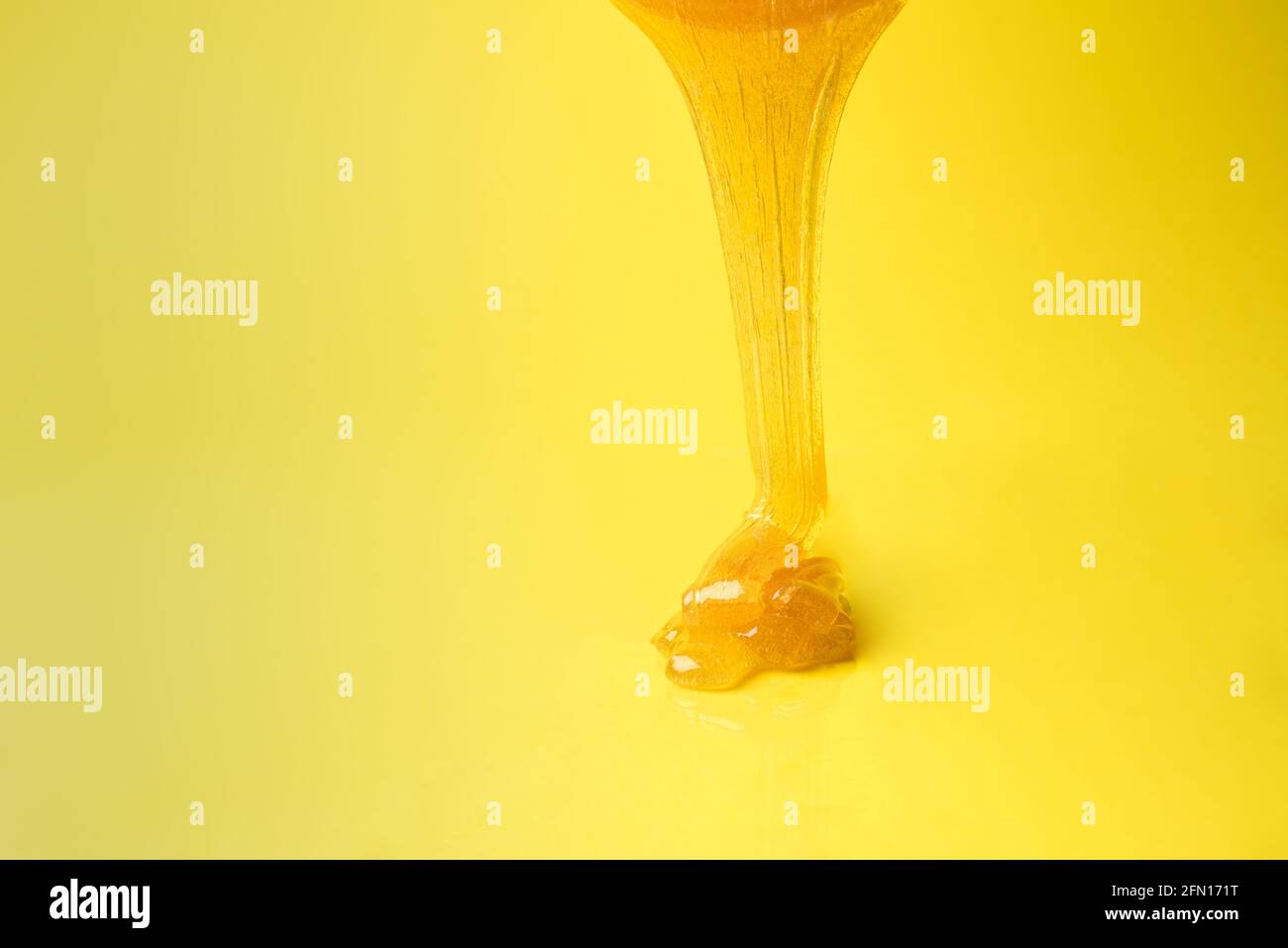 Liquid yellow paste sugaring hi-res stock photography and images - Alamy