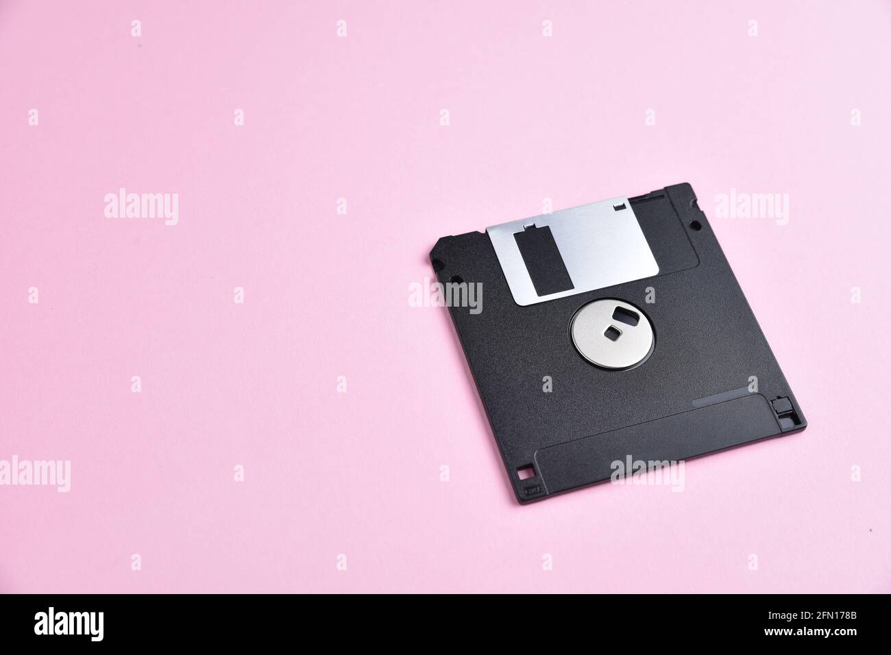 Floppy disk on pink background. Retro computer diskette Stock Photo - Alamy