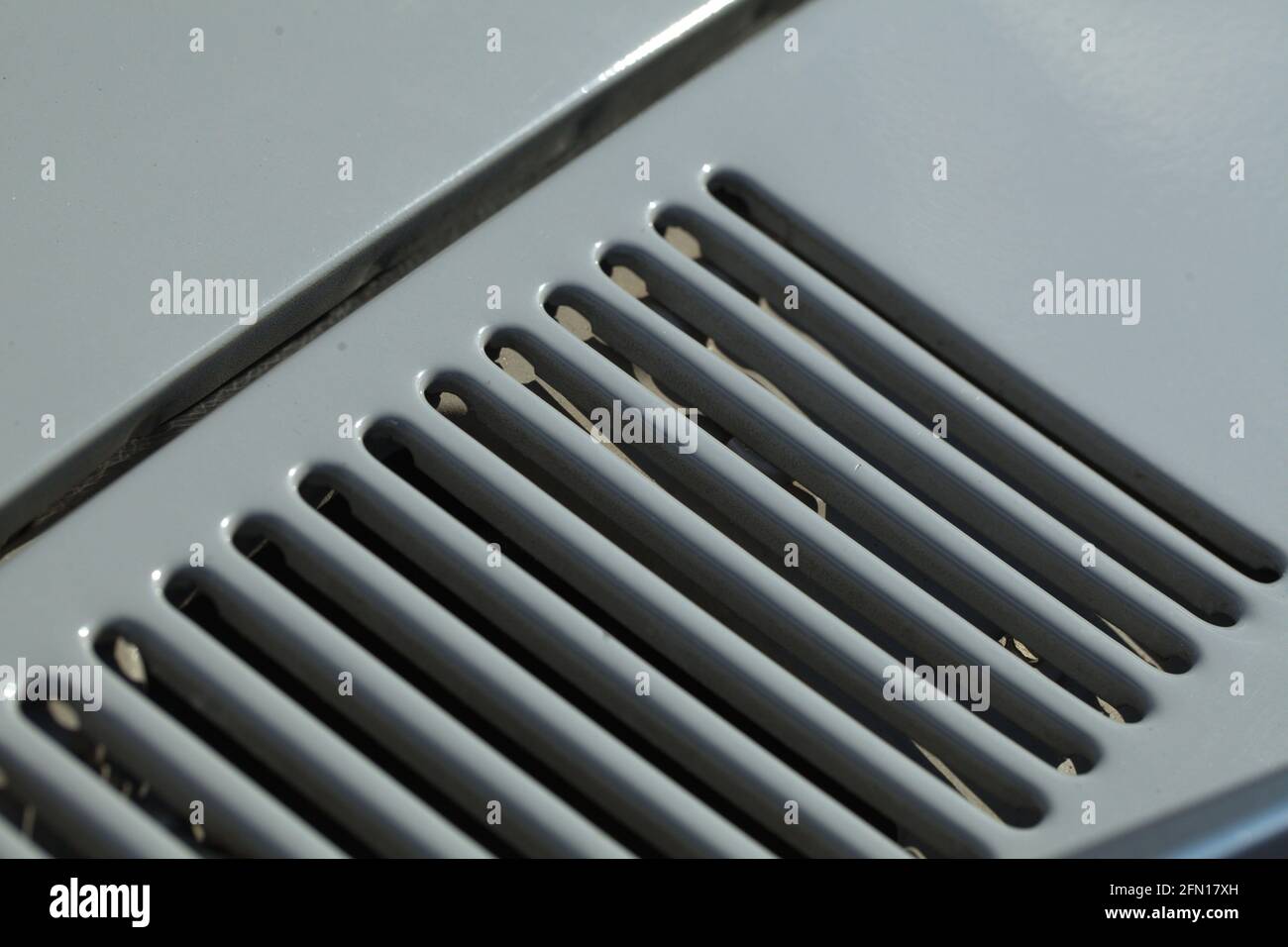 air intake grille on the body of a retro car Stock Photo - Alamy