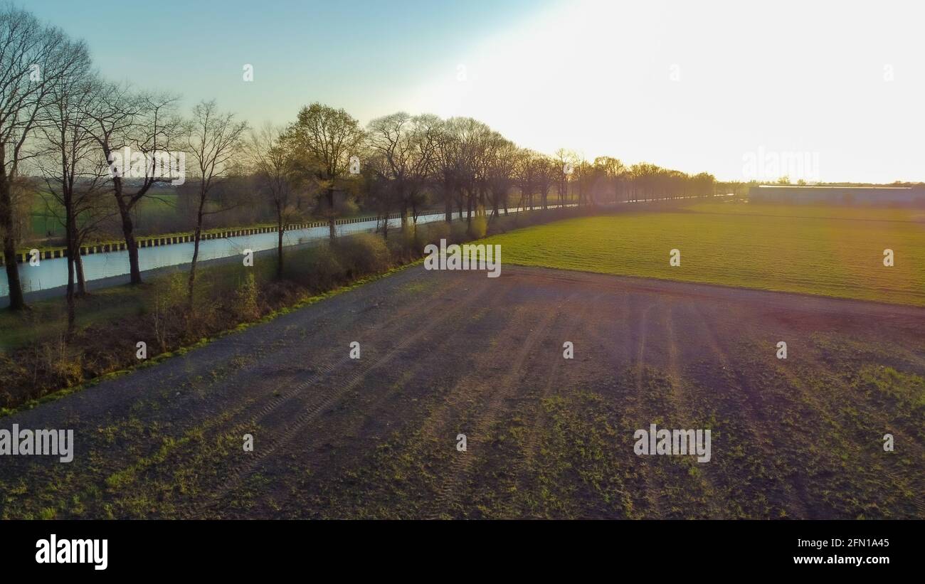 Aerial view with a drone of a spring wavy agricultural countryside ...