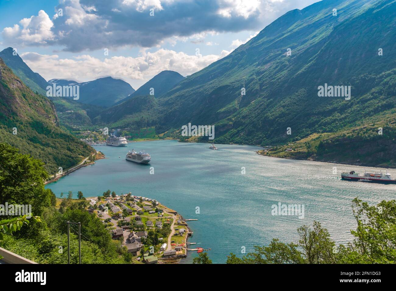 Aerial shot of lake mountains and ships in Geirangerfjord, Stranda ...
