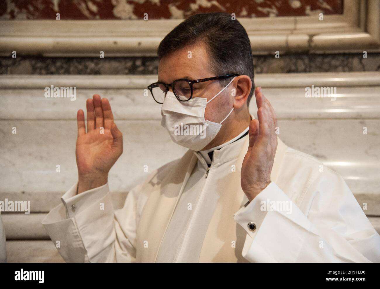 May 13, 2021 : Priest prays during mass on the occasion of the 40th ...