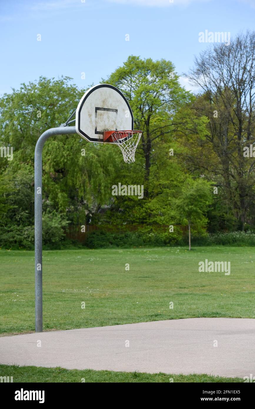 Basketball hoop with net on an outdoor basketball court Stock Photo - Alamy