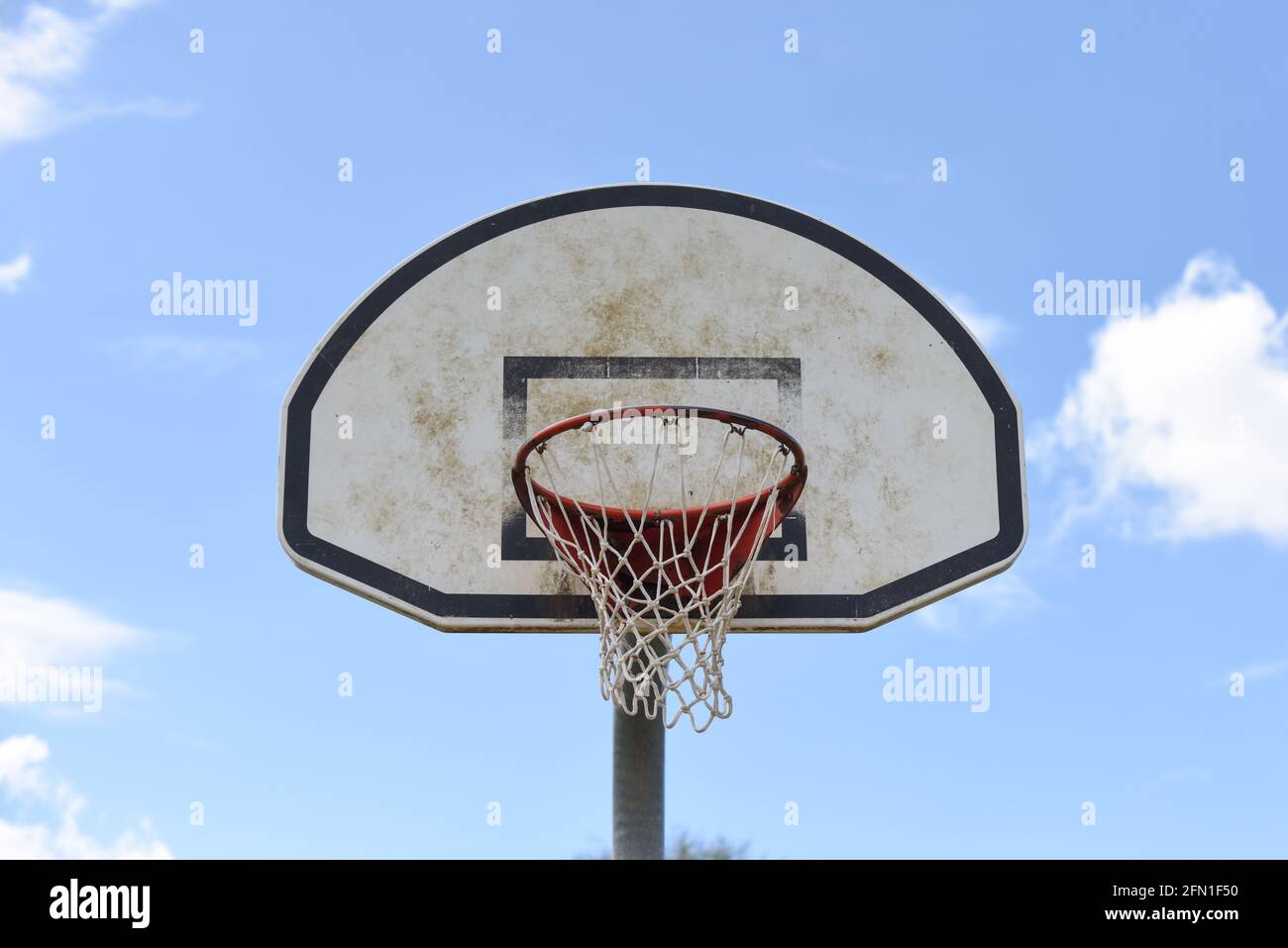 Basketball hoop with net on an outdoor basketball court Stock Photo - Alamy