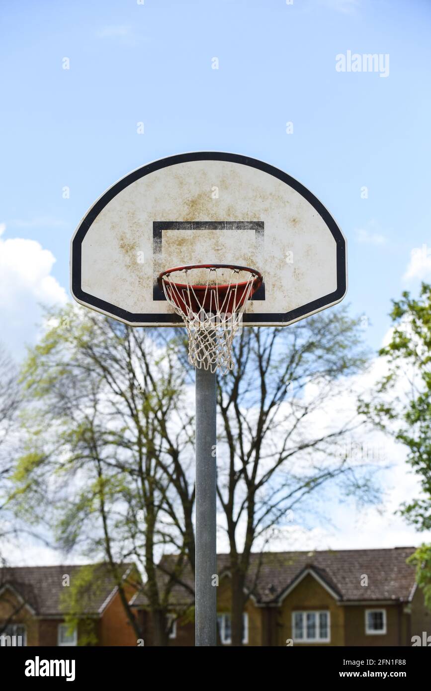 Basketball hoop with net on an outdoor basketball court Stock Photo - Alamy