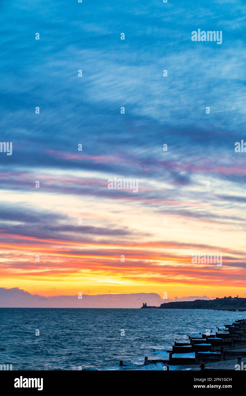 The Kent coast Reculver headland with the twin towers of the 12th ...