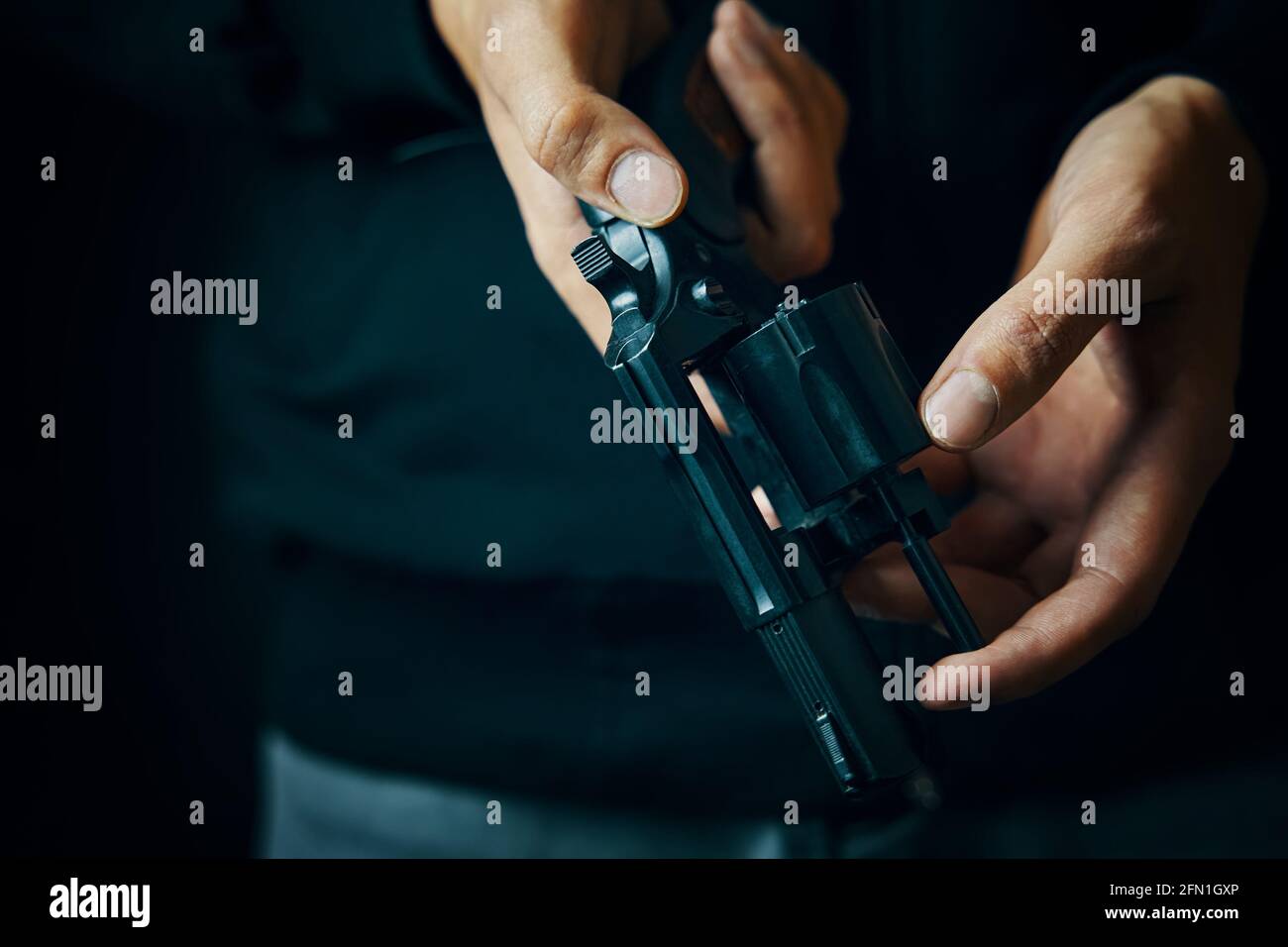 Hand holding bullets cartridge bullet hi-res stock photography and ...