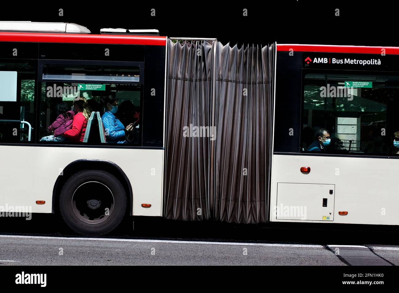 People sat on bus, Barcelona, Spain Stock Photo - Alamy