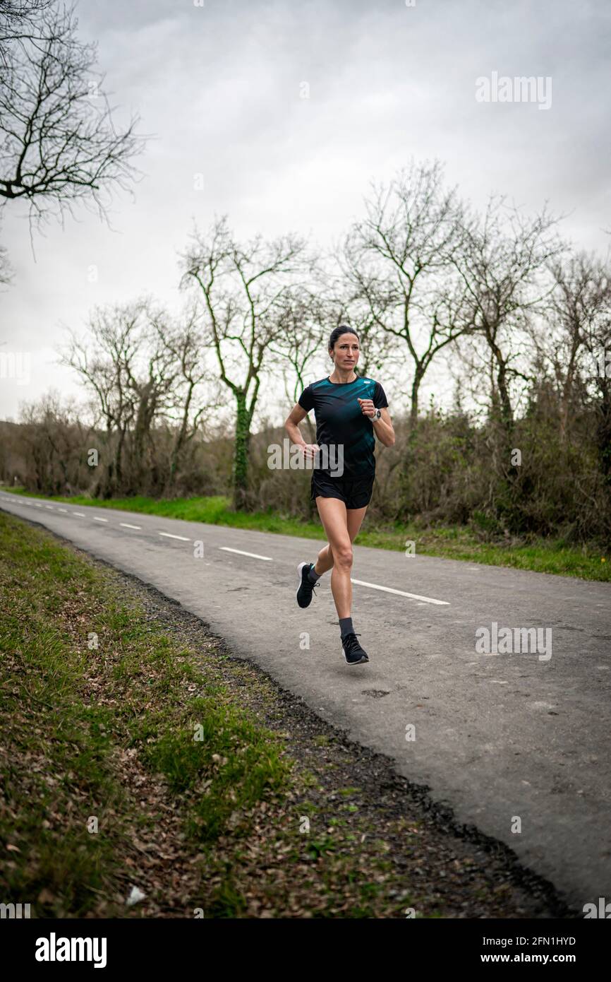 Girl running in nature, it is her healthy and free lifestyle Stock ...