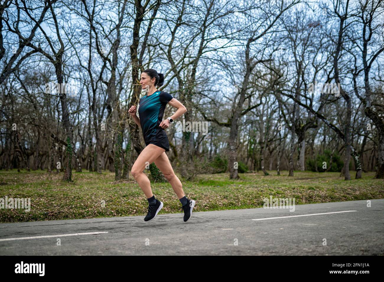 Girl running in nature, it is her healthy and free lifestyle Stock ...
