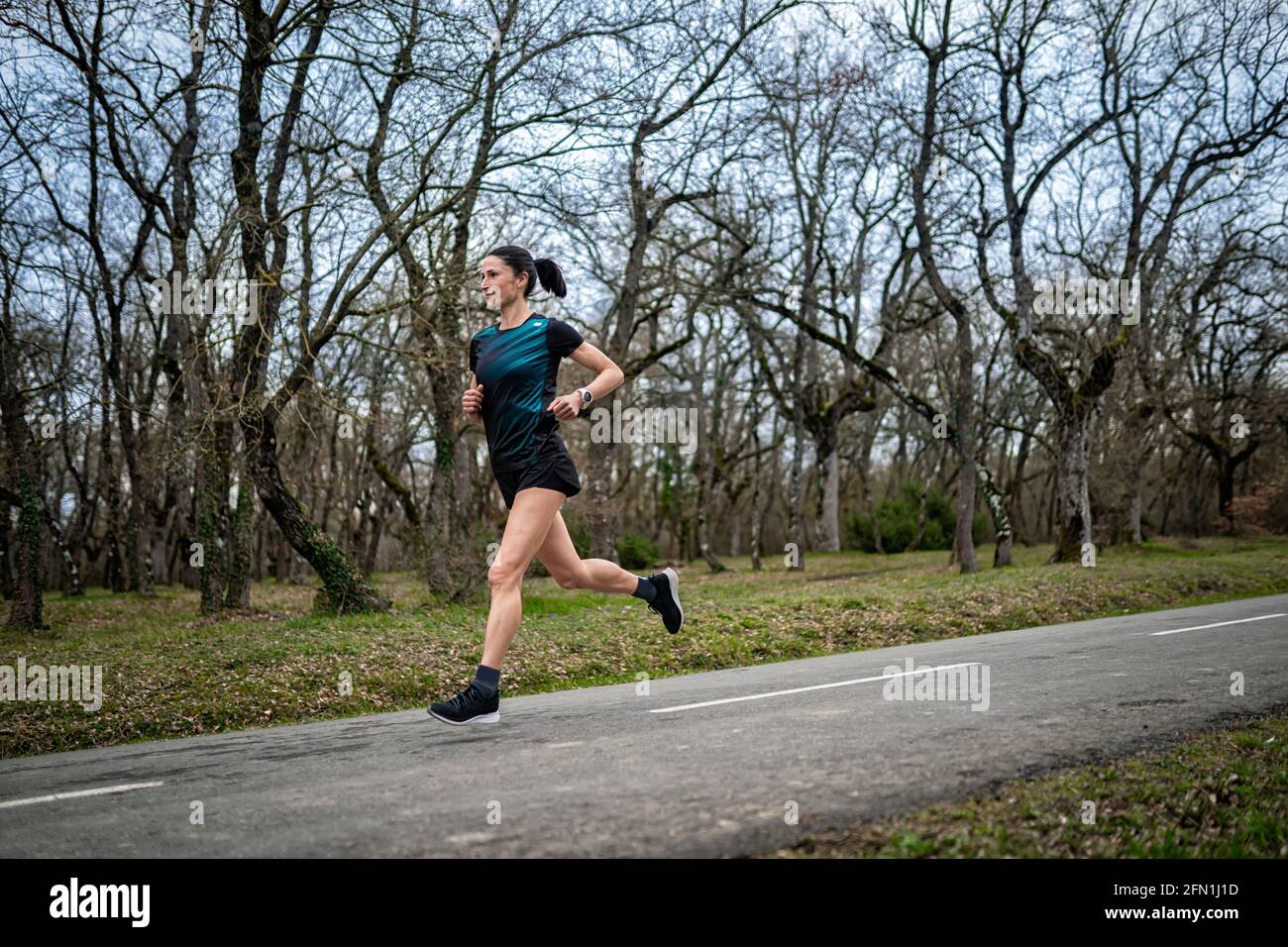 Girl running in nature, it is her healthy and free lifestyle Stock ...