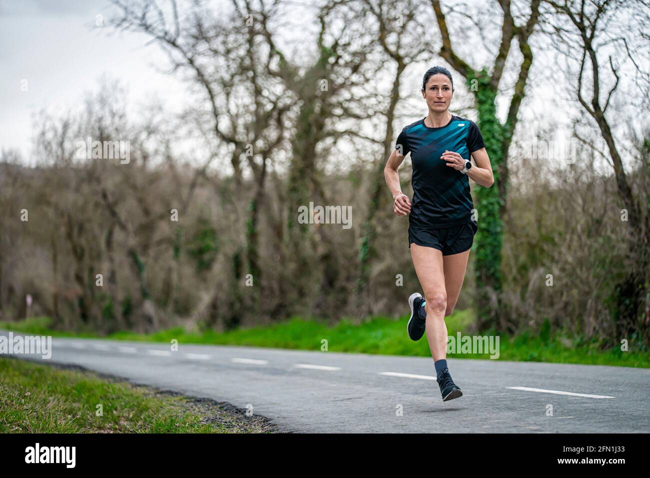 Girl running in nature, it is her healthy and free lifestyle Stock ...