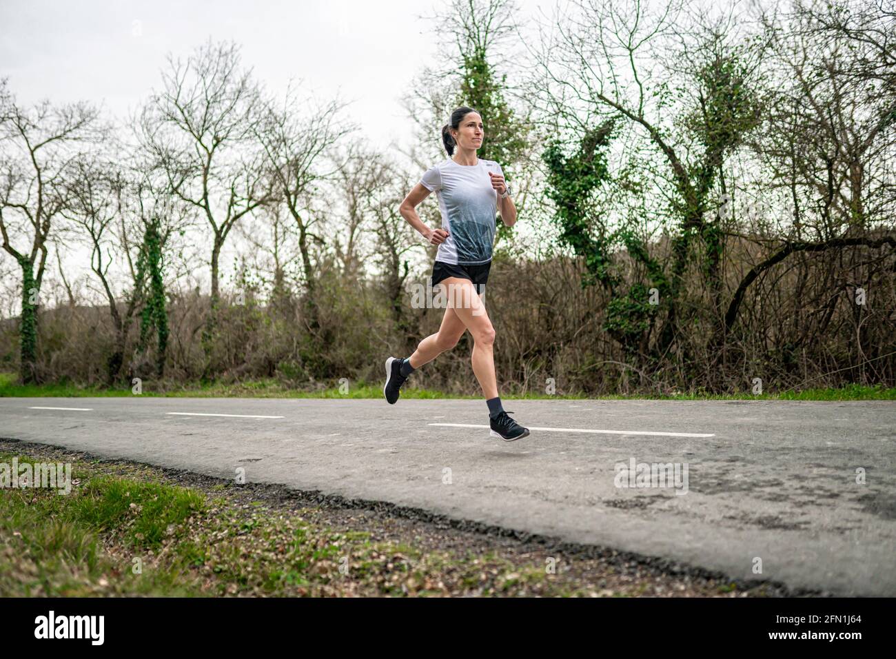 Girl running in nature, it is her healthy and free lifestyle Stock ...
