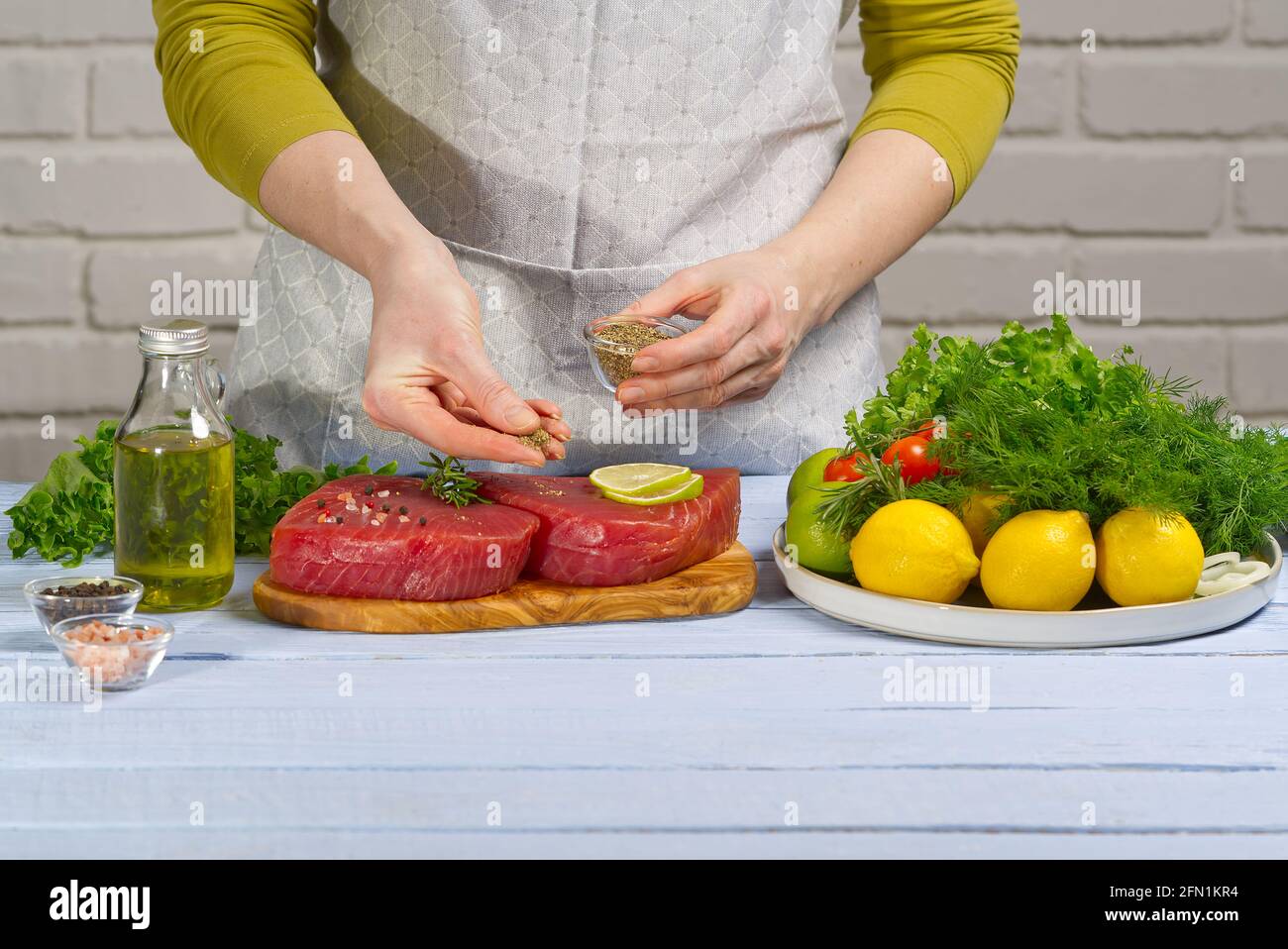 cooking tuna steak. Fresh Atlantic bluefin tuna steak, with spices and ...