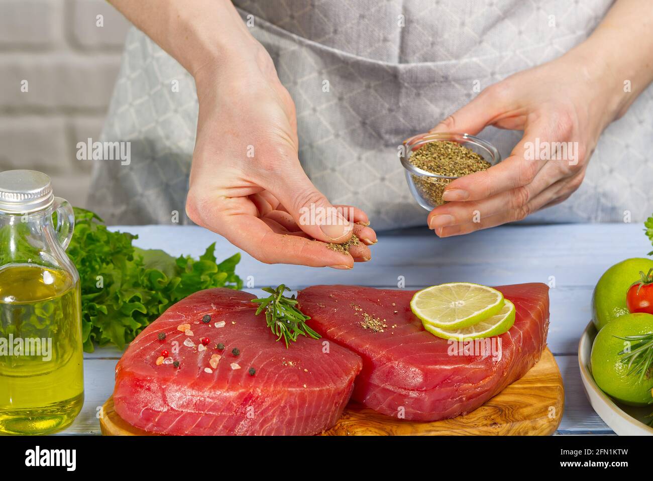 cooking tuna steak. Fresh Atlantic bluefin tuna steak, with spices and ...