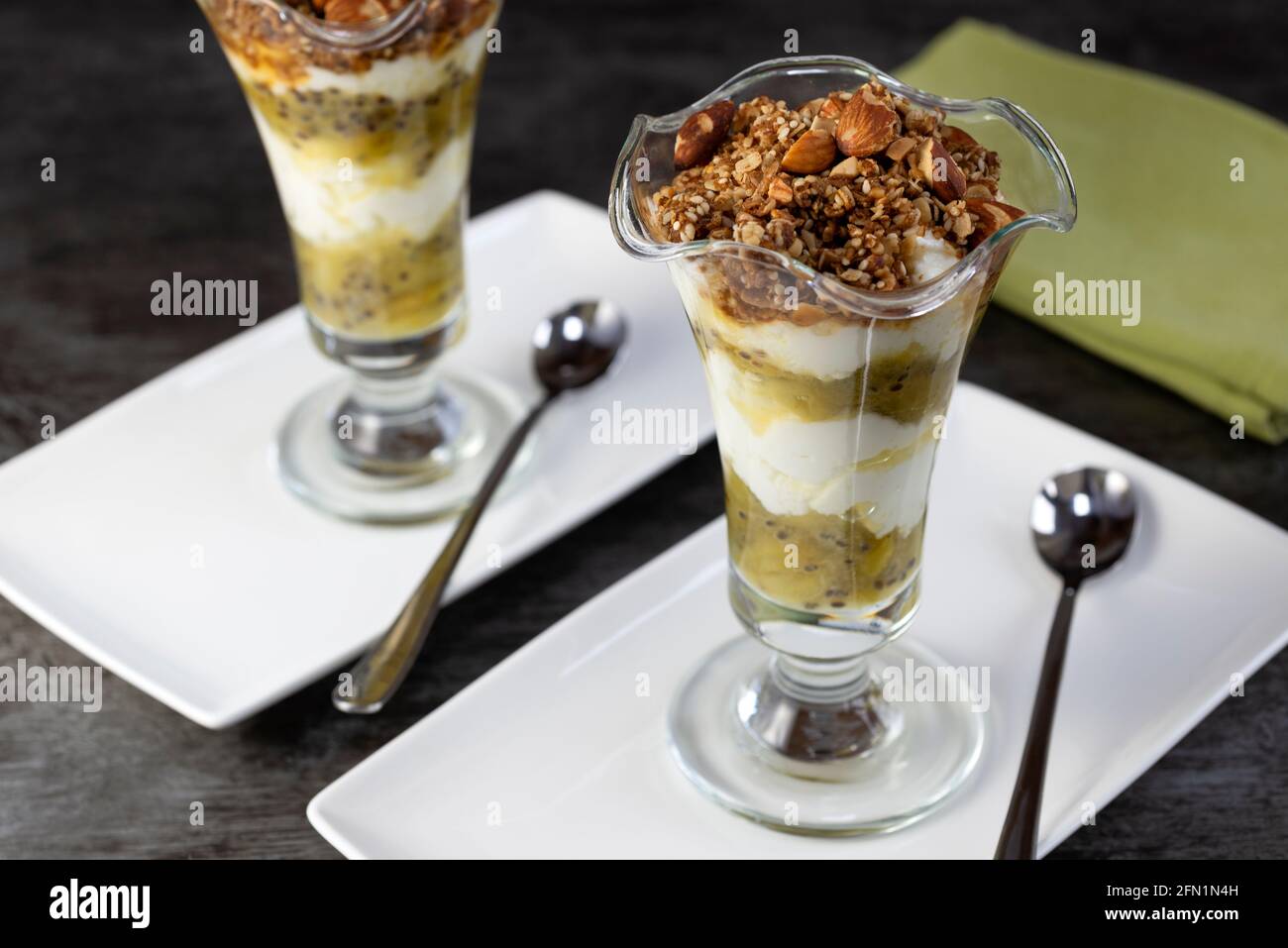 Gooseberry yoghurt pots topped with granola oat and nut topping Stock ...