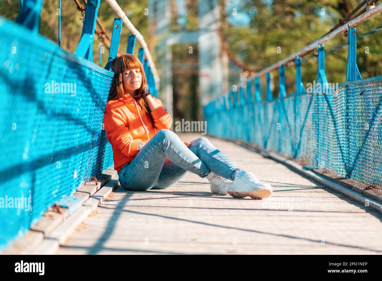Girl basking in sun hi-res stock photography and images - Alamy