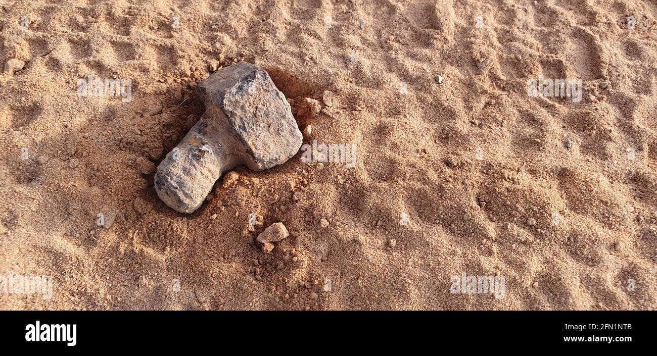a rusty bolt lost in the sand Stock Photo - Alamy