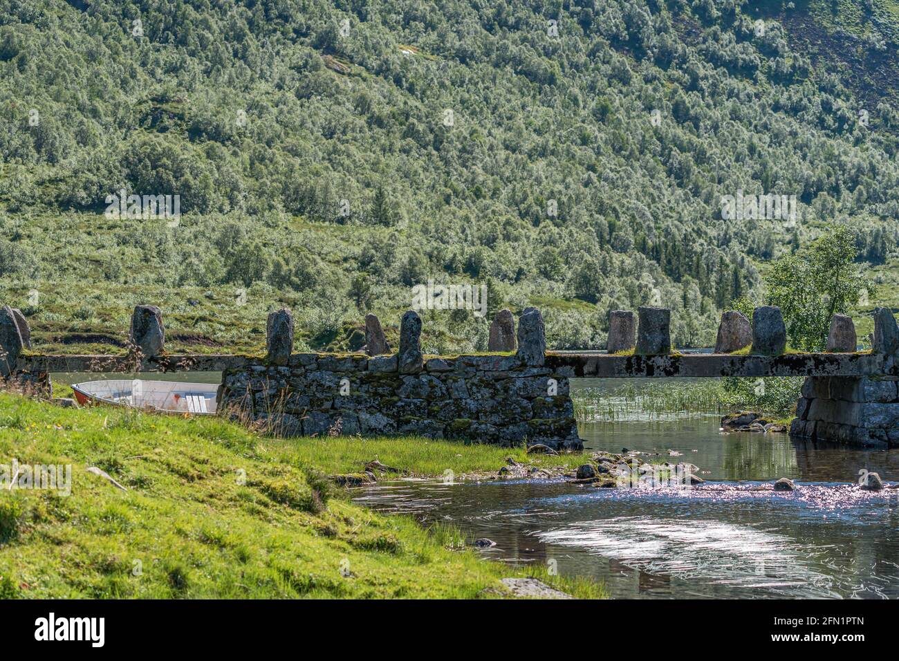 FLO, NORWAY - 2020 AUGUST 10. Old stone bridge in the beautiful nature ...