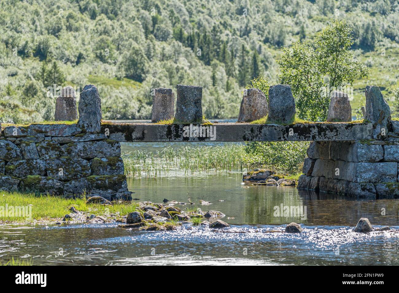 FLO, NORWAY - 2020 AUGUST 10. Old stone bridge in the beautiful nature ...
