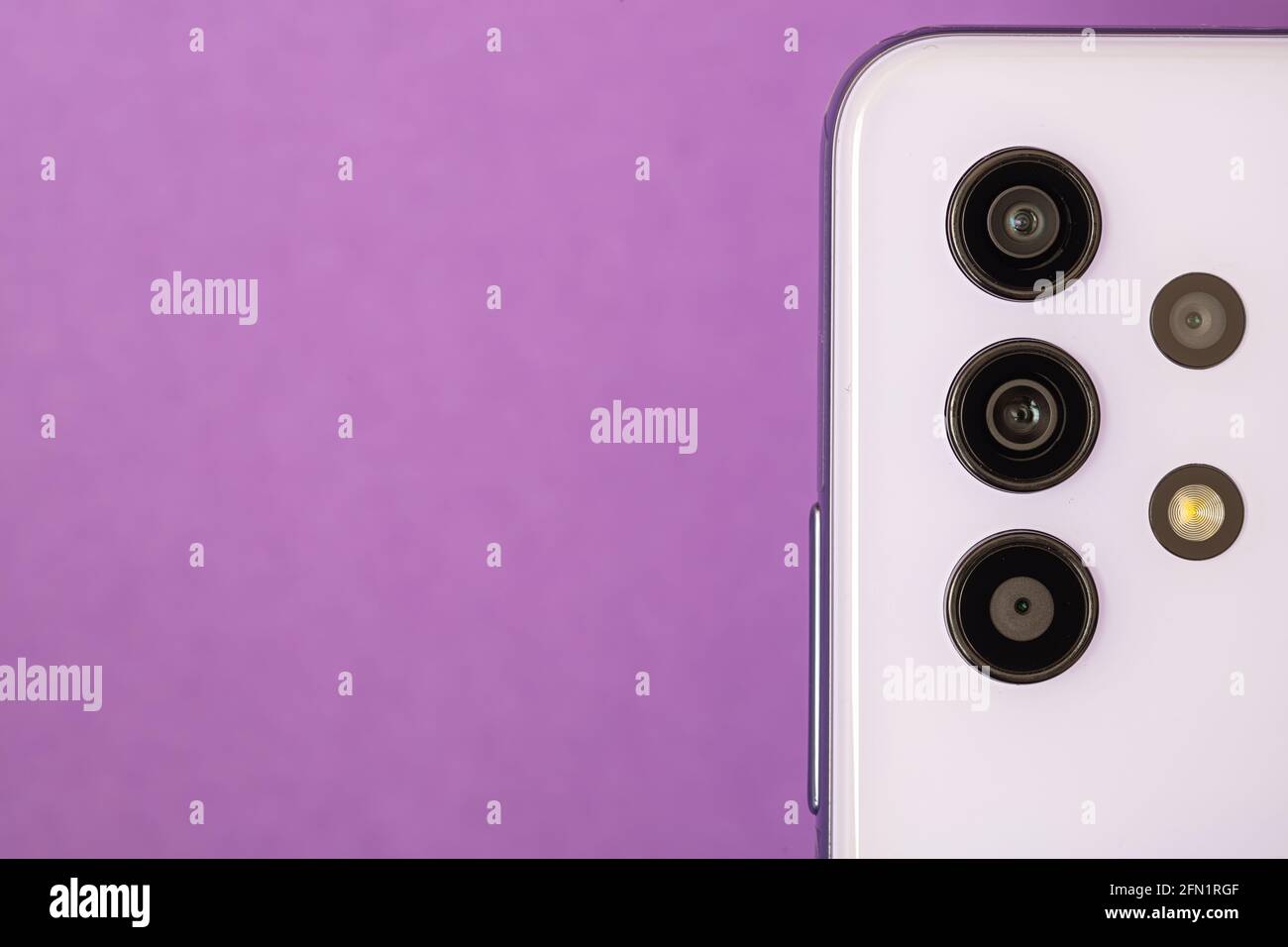 Violet smartphone on purple background for design purpose Stock Photo ...