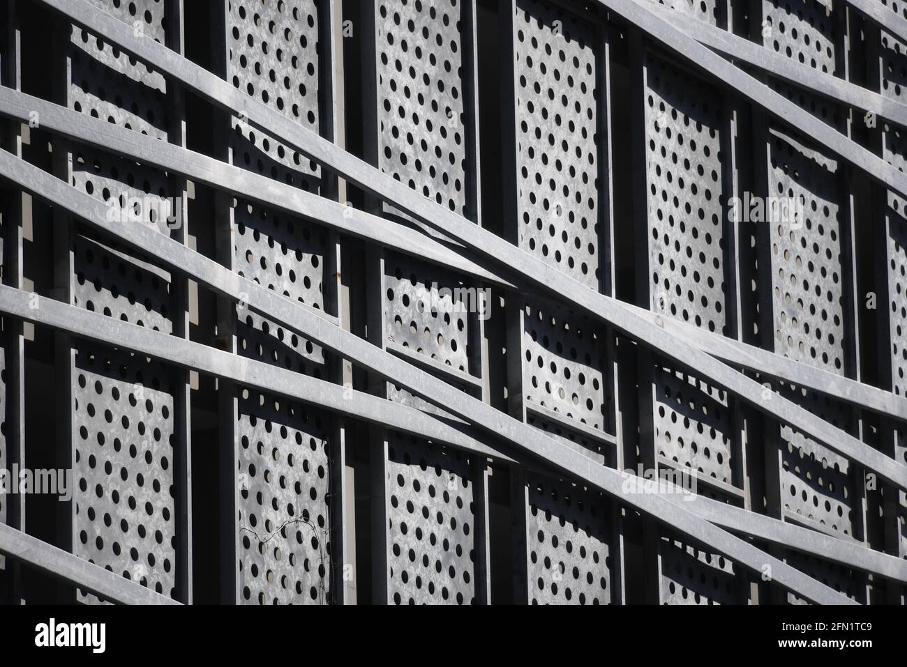 CNC technology perforated metal panel Stock Photo - Alamy