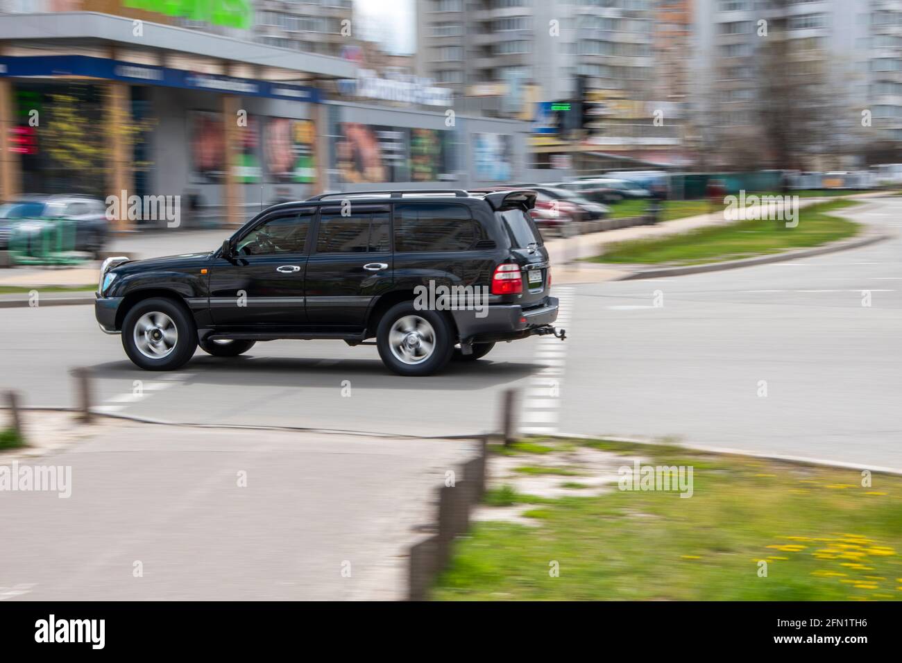 Ukraine, Kyiv - 26 April 2021: Black Toyota Land Cruiser car moving on ...