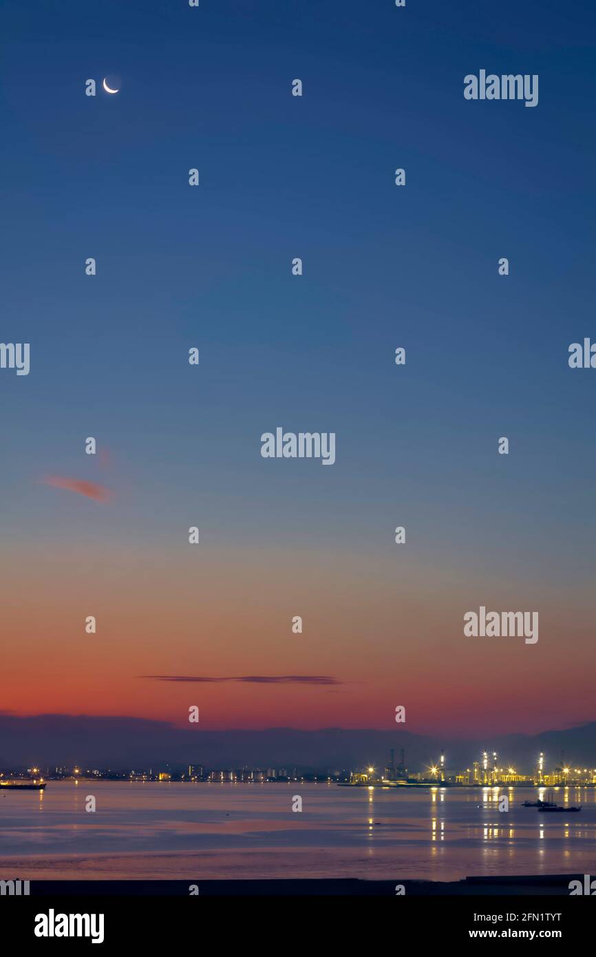 From twilight into dawn Stock Photo - Alamy