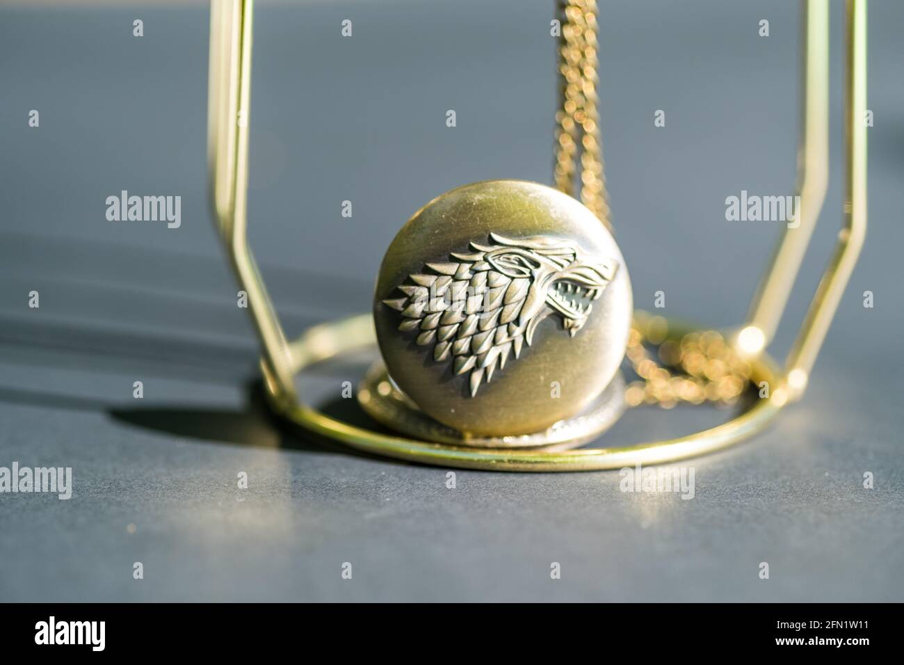Pocket watch with a wolf head design closeup. Selective Focus Stock ...