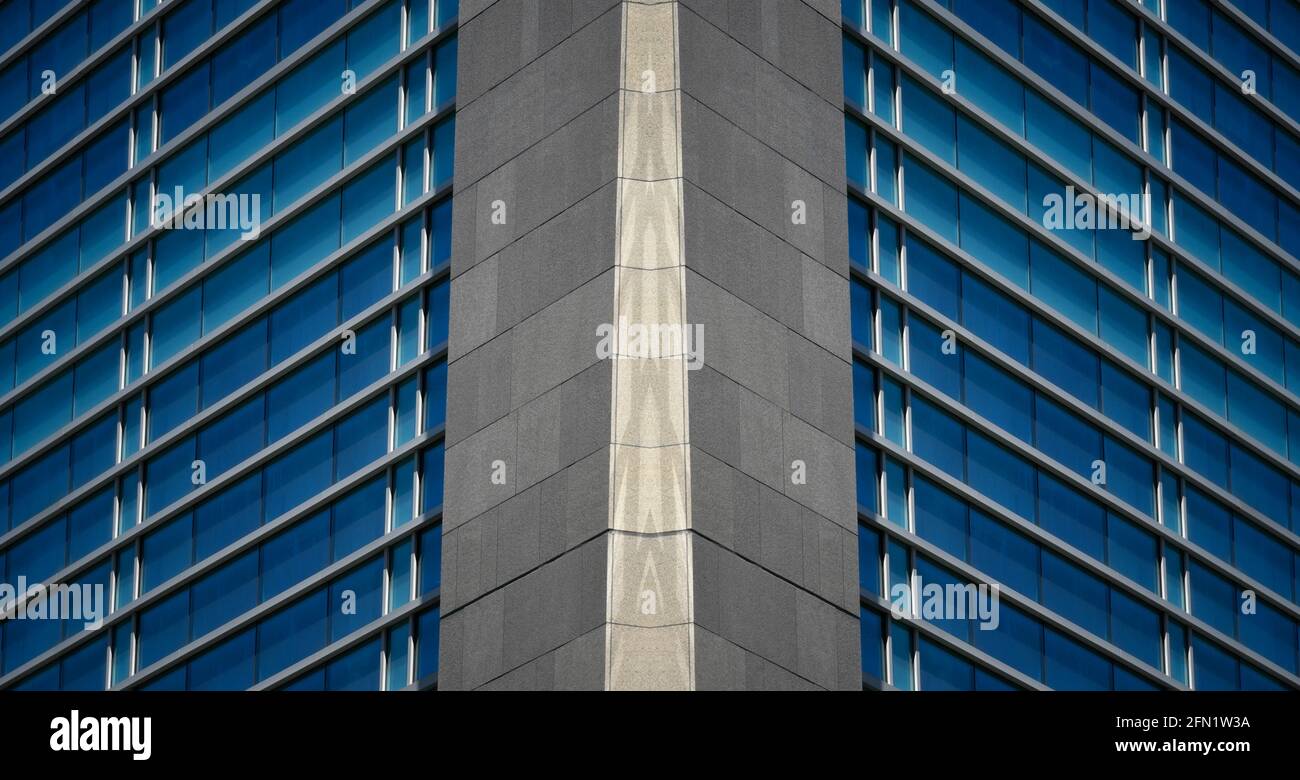 Commercial high-rise building concrete and glass facade in San Diego ...