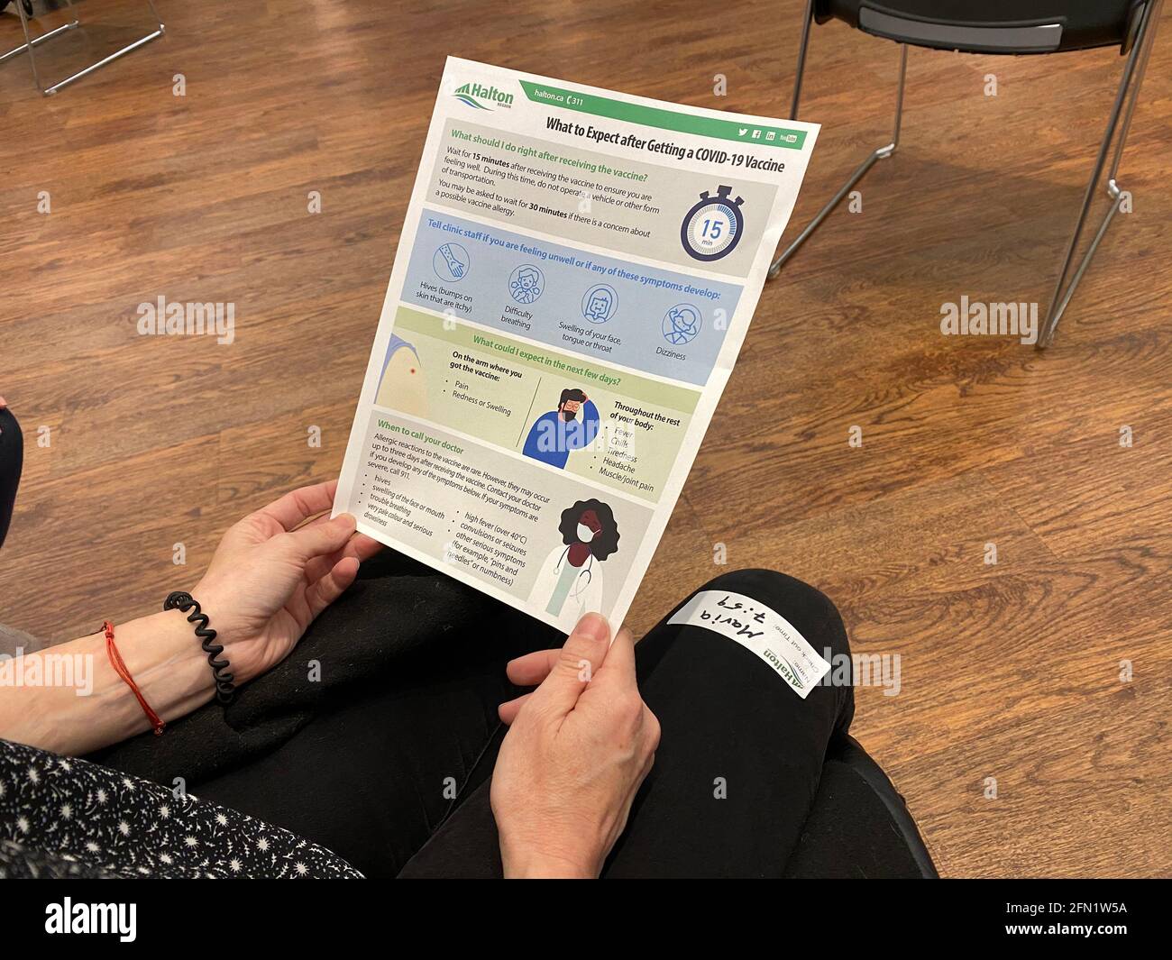 WOMAN GETS MODERNA VACCINE DURING COVID-19 PANDEMIC Stock Photo - Alamy