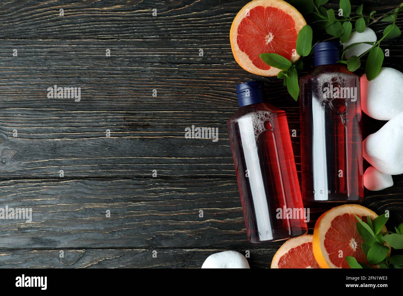 Natural shower gel and ingredients on wooden background Stock Photo - Alamy