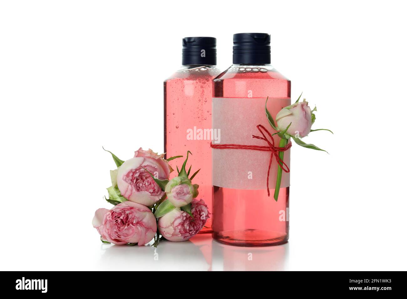 Shower gel and roses isolated on white background Stock Photo - Alamy