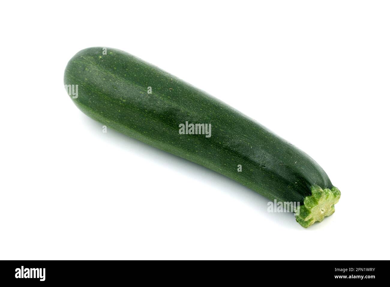 Zucchini isolated on a white background Stock Photo - Alamy