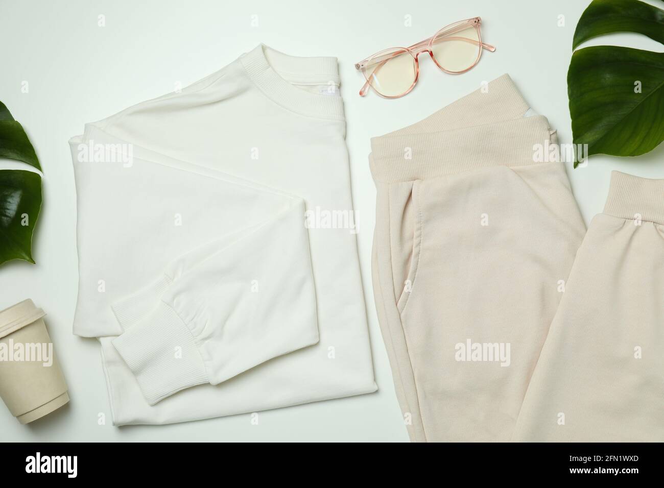 Stylish female wear on white background, top view Stock Photo - Alamy