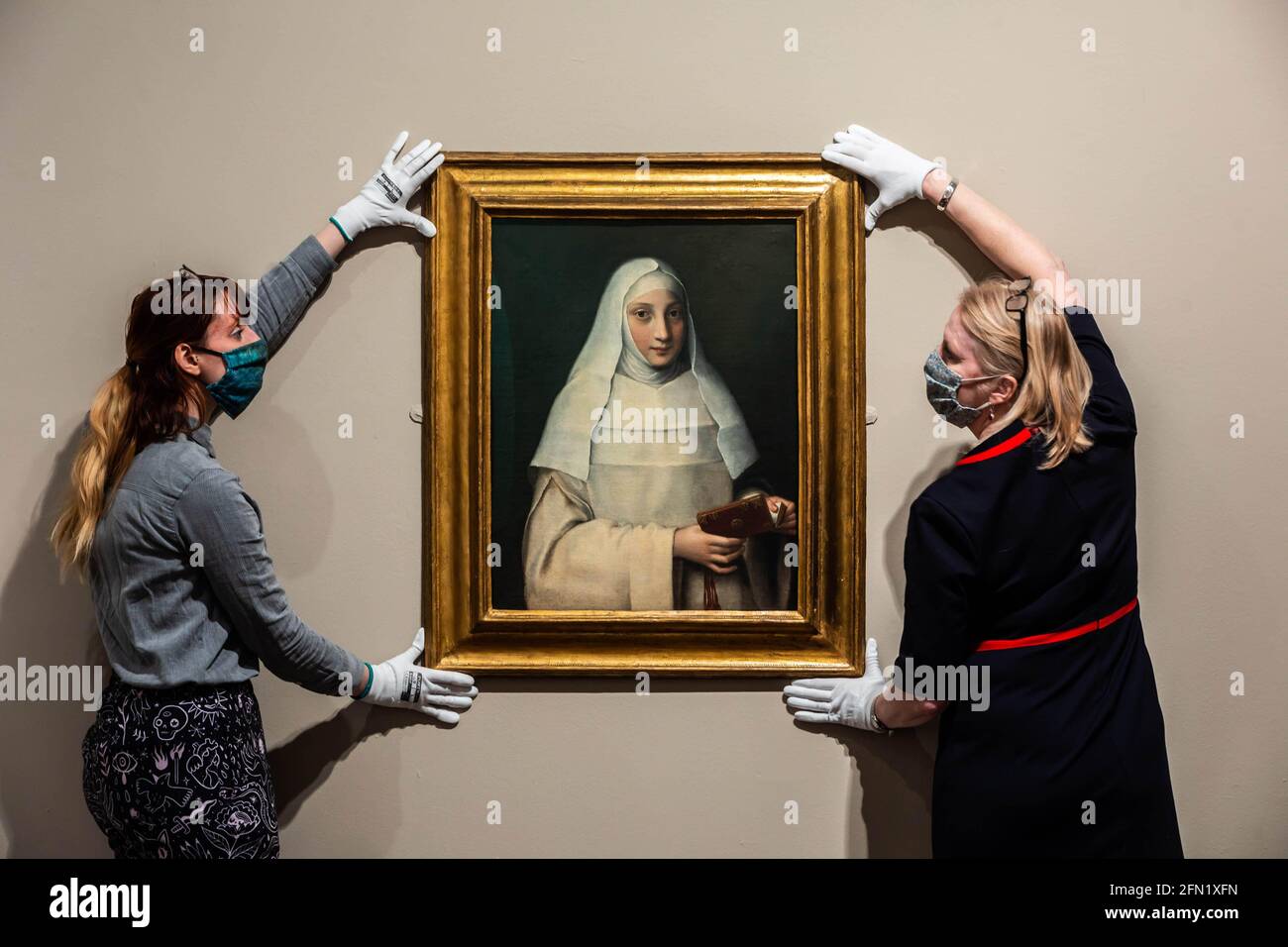 EDITORIAL USE ONLY (Left to right) Curatorial trainee Jemma Craig, aged ...